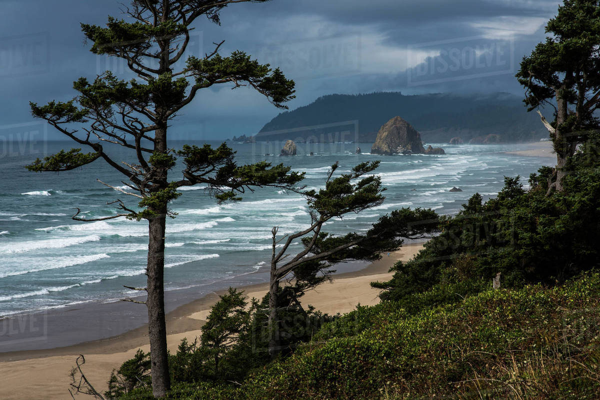 Haystack Rock and Tillamook head are visible from US Highway 101 ...