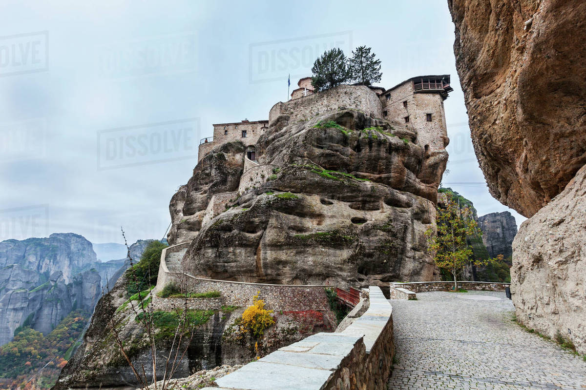 Monastery Perched On A Cliff; Meteora, Greece - Stock Photo - Dissolve