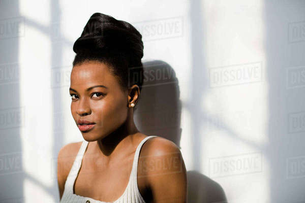 Portrait Of An African Canadian Woman Leaning Against A Wall; Toronto ...