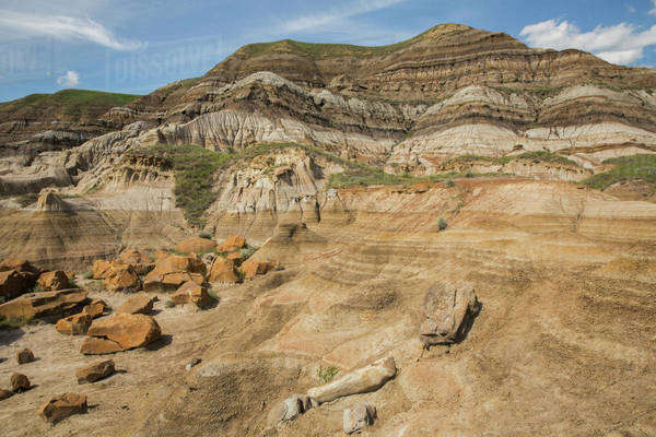 The hillsides around Drumheller, Alberta, with layers of sedimentary ...