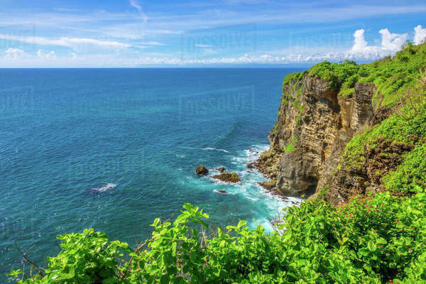 Indonesia. Rocky Coast of a Tropical Island and Sunny Day. - Stock ...
