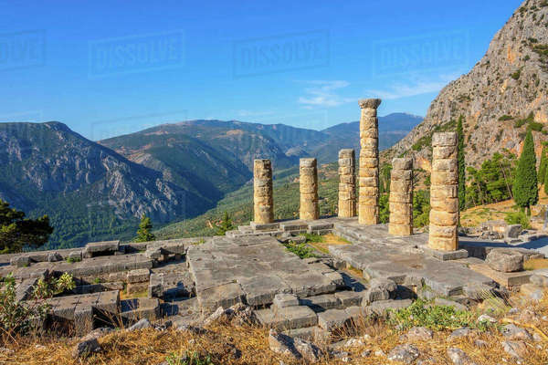 Greece. Delphi. Ancient ruins on a background of sunny mountains and ...