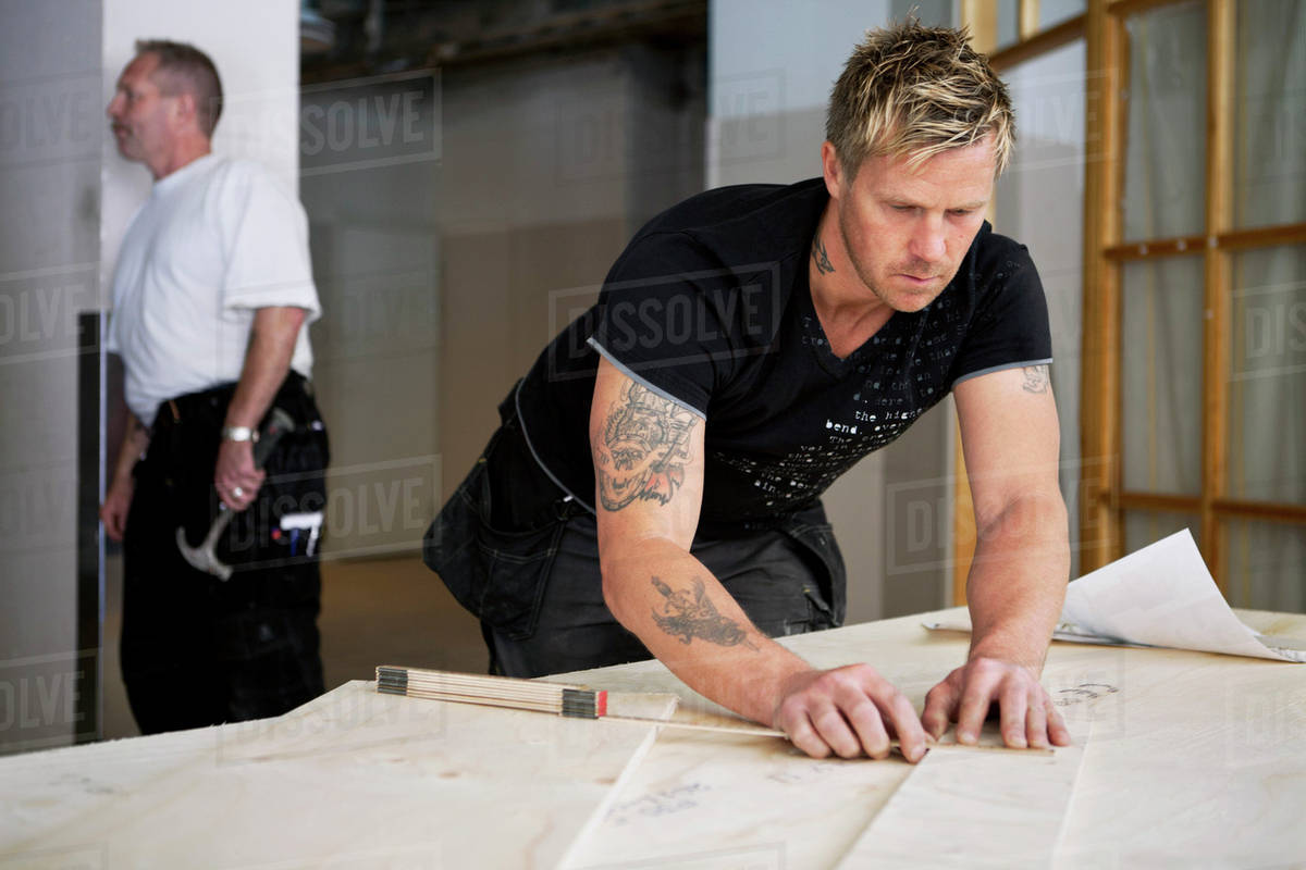 Young carpenter working - Royalty-free Stock Photo | Dissolve