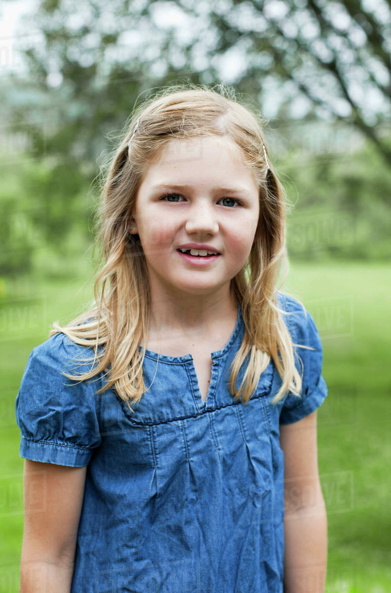 Portrait of smiling pre-adolescent girl - Royalty-free Stock Photo ...