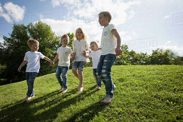 Children playing in park - Stock Photo - Dissolve