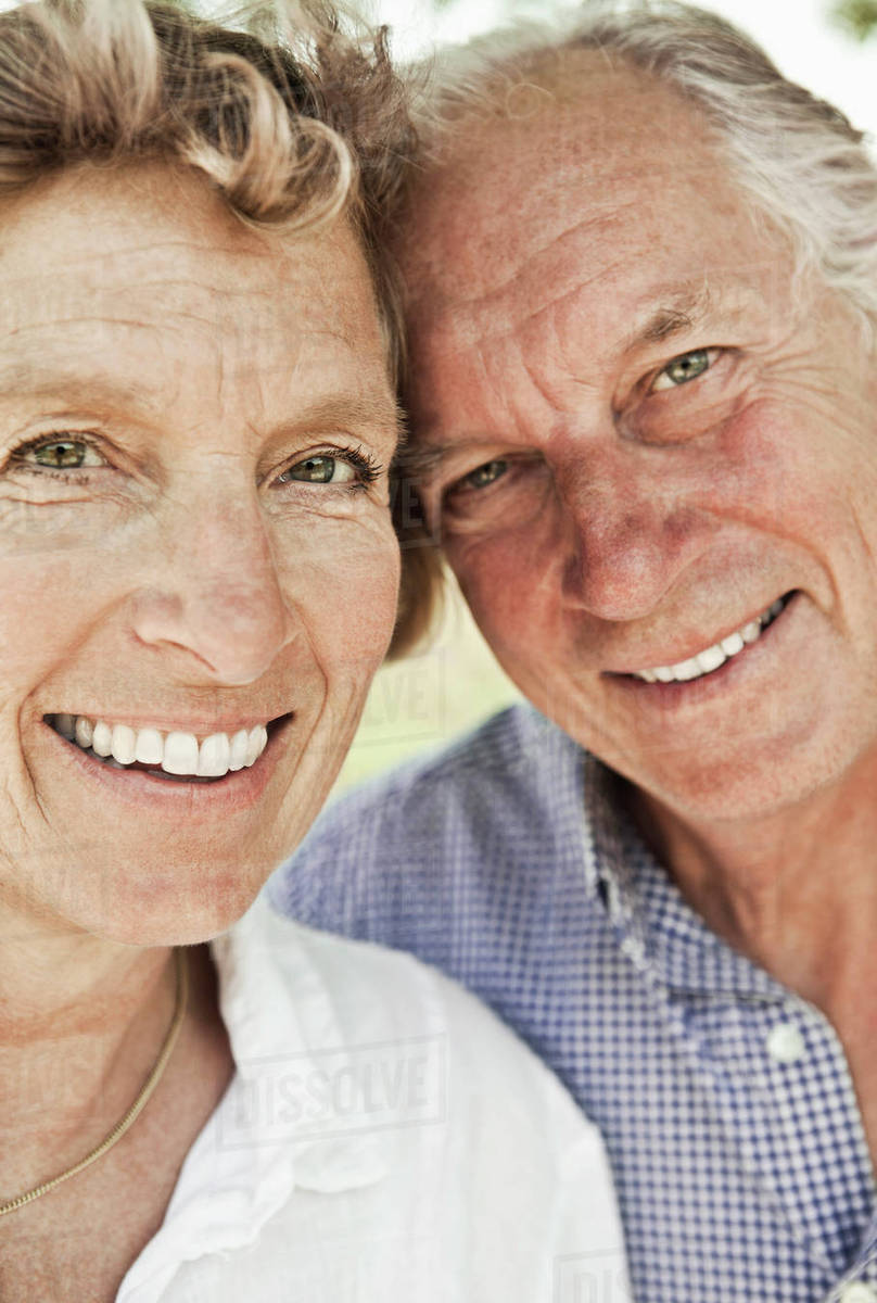 Close up portrait of smiling couple - Royalty-free Stock Photo | Dissolve