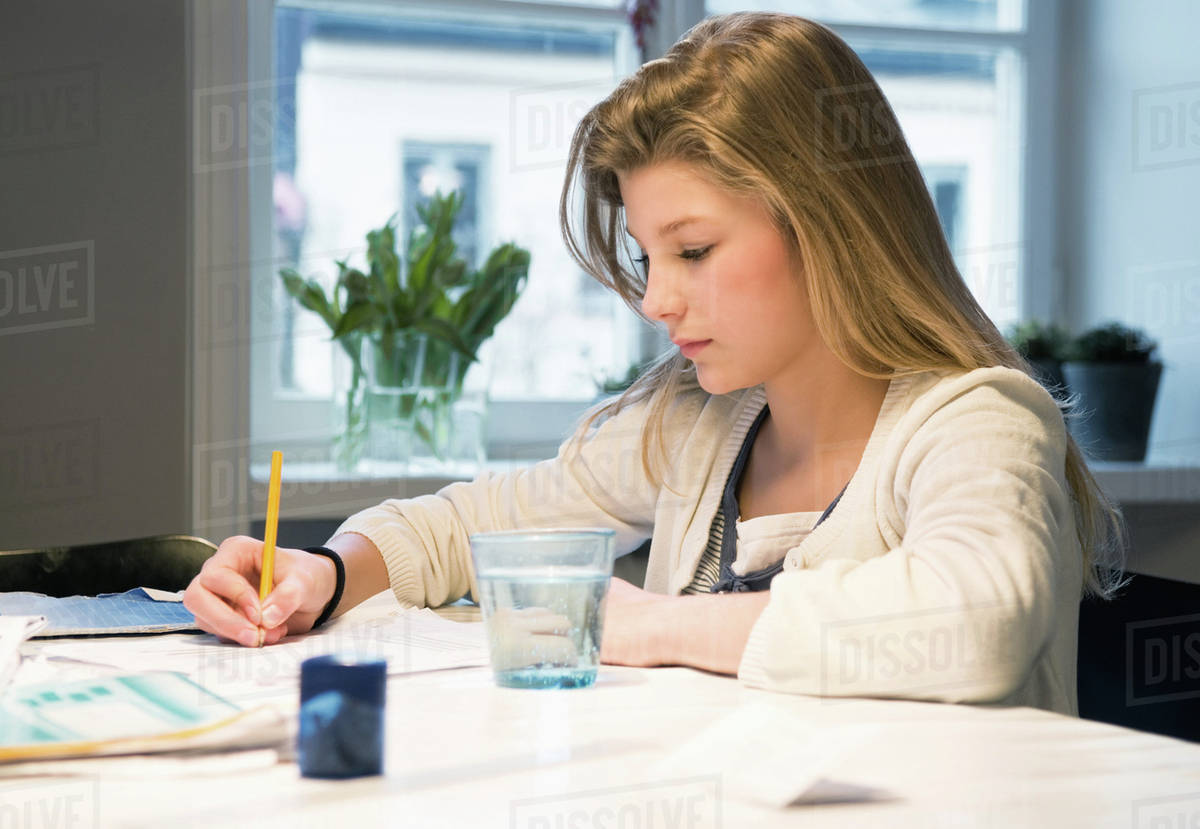 Teenagegirl studying - Stock Photo - Dissolve
