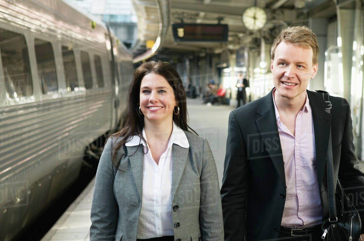 Two people at the station - Royalty-free Stock Photo | Dissolve