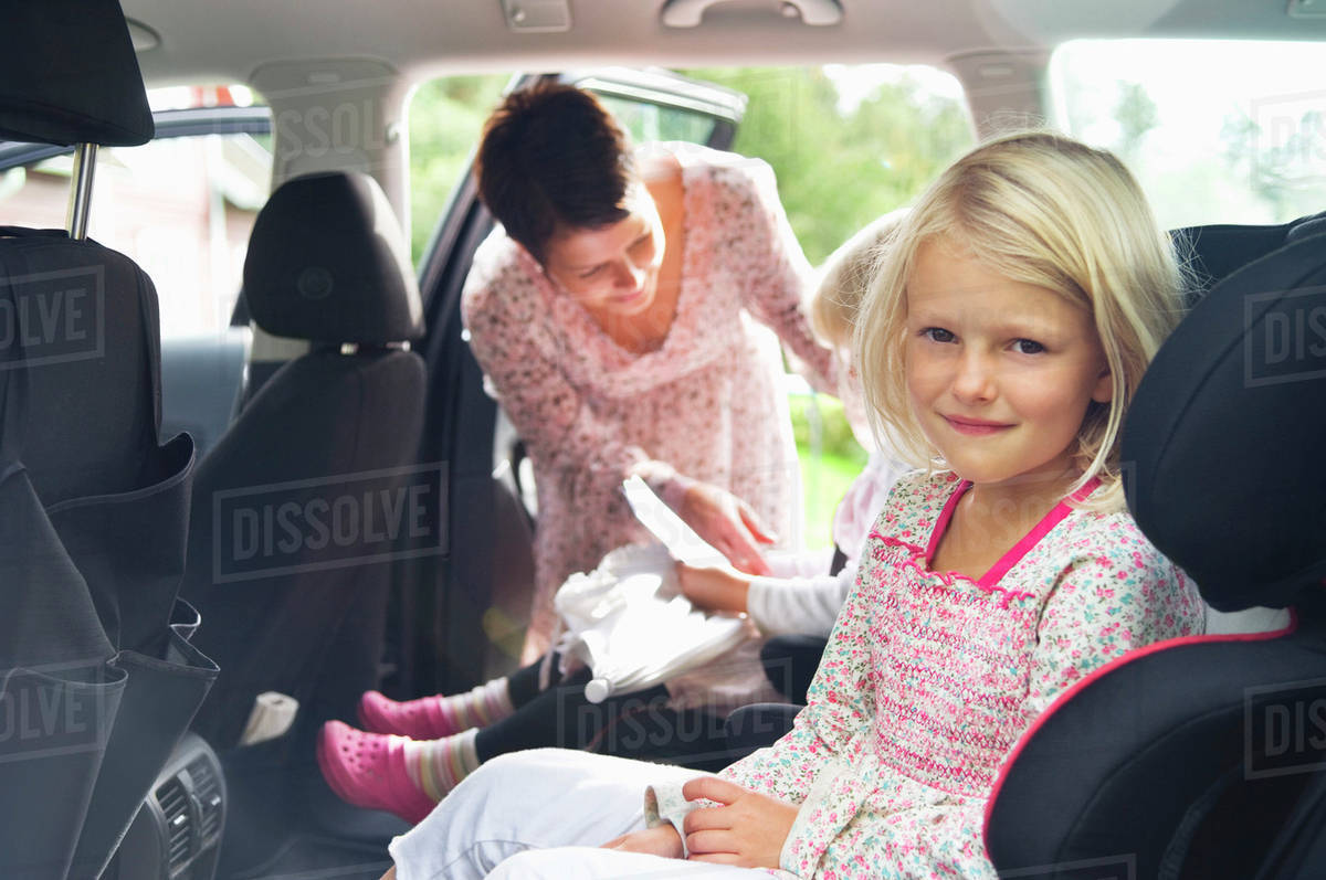 Children sitting in car - Royalty-free Stock Photo | Dissolve