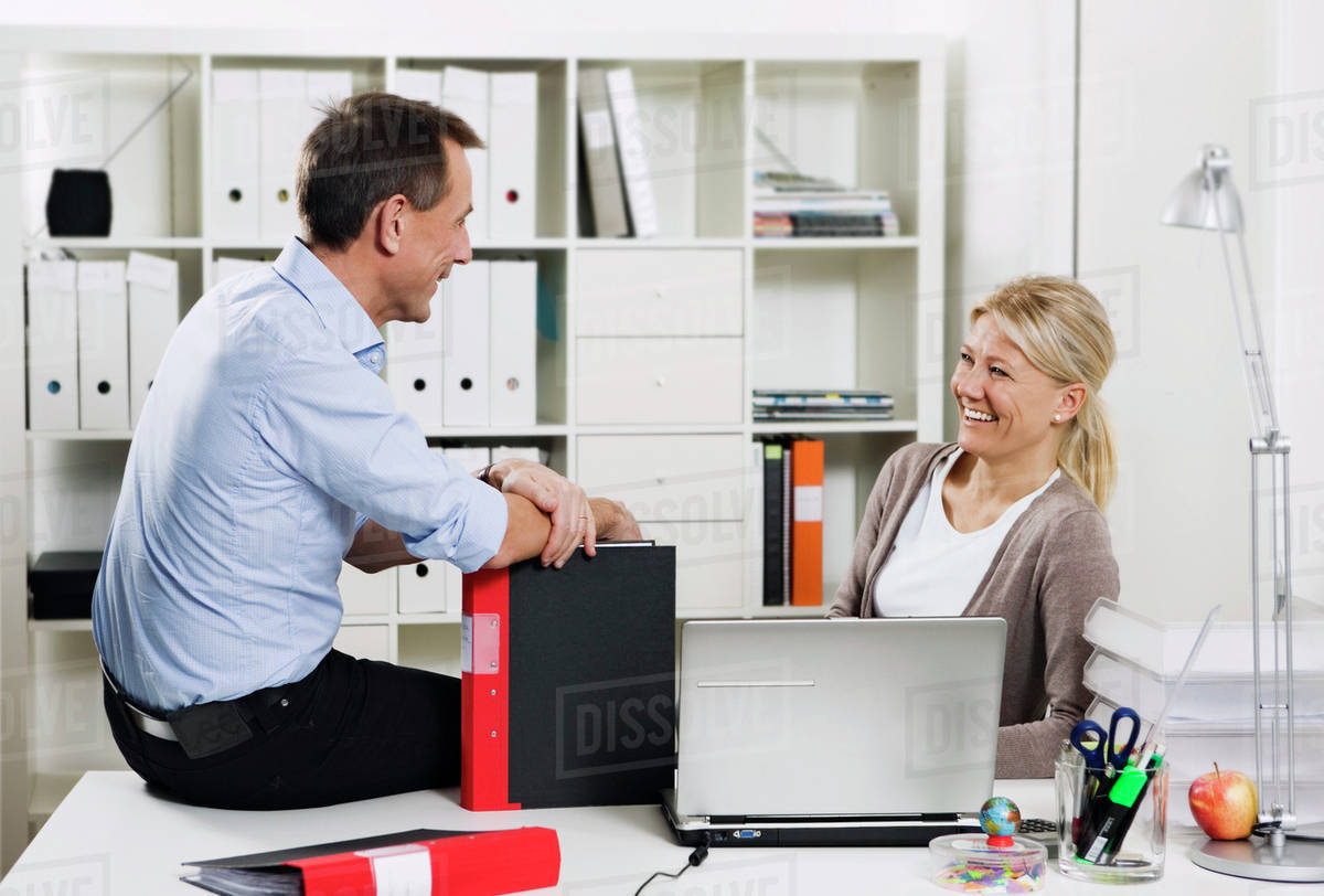 Two colleagues at work - Royalty-free Stock Photo | Dissolve