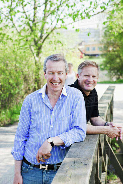 Two men on bridge - Royalty-free Stock Photo | Dissolve
