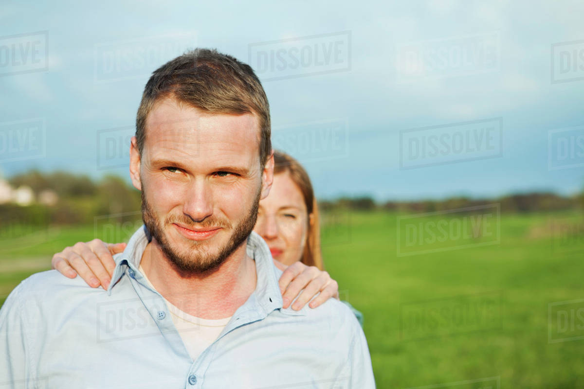 Man with hands on his shoulders - Royalty-free Stock Photo | Dissolve