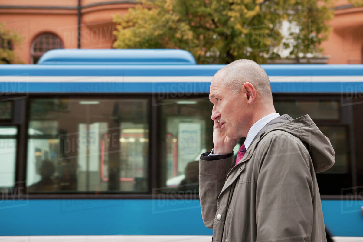Man waiting on bus - Royalty-free Stock Photo | Dissolve