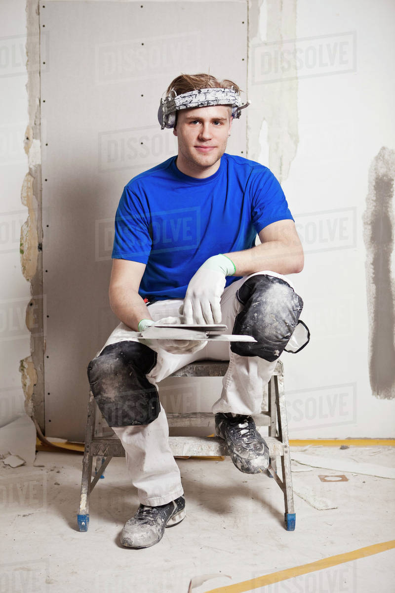 Construction worker resting - Stock Photo - Dissolve