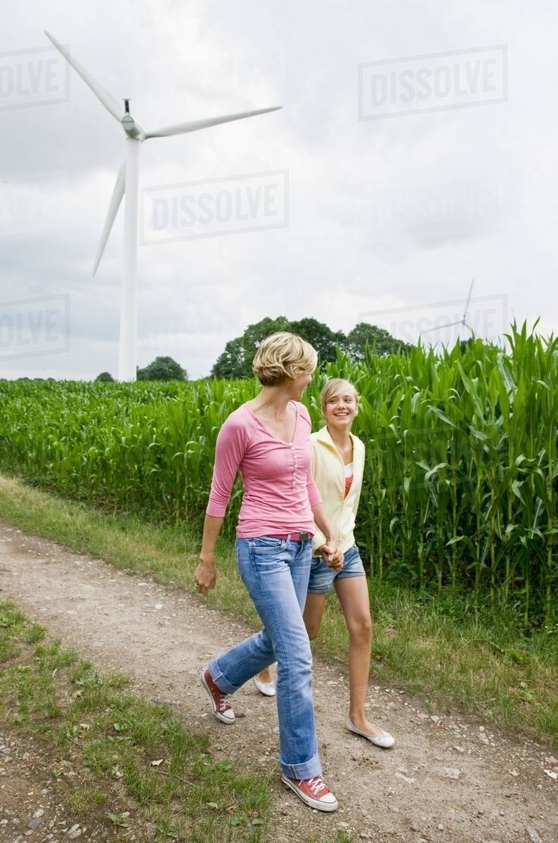 Woman and girl taking a walk - Royalty-free Stock Photo | Dissolve