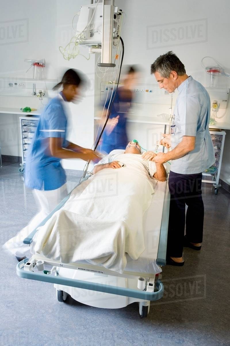 A doctor helping a patient in hospital - Royalty-free Stock Photo ...
