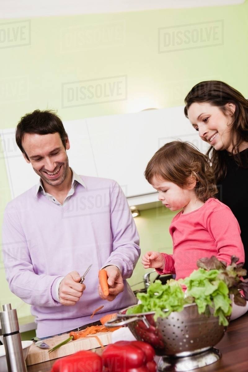 Family cooking together - Royalty-free Stock Photo | Dissolve