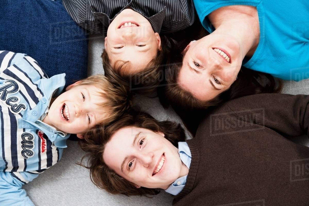 Three brothers and mother - Royalty-free Stock Photo | Dissolve