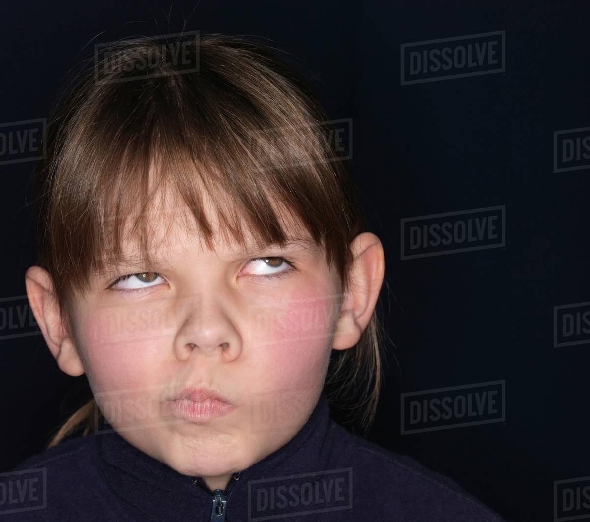 Girl making a grimace, close-up - Royalty-free Stock Photo | Dissolve