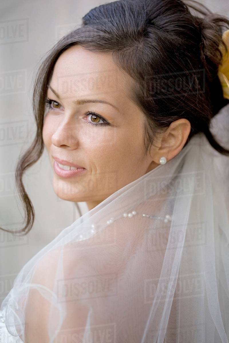Portrait of a smiling bride. - Royalty-free Stock Photo | Dissolve