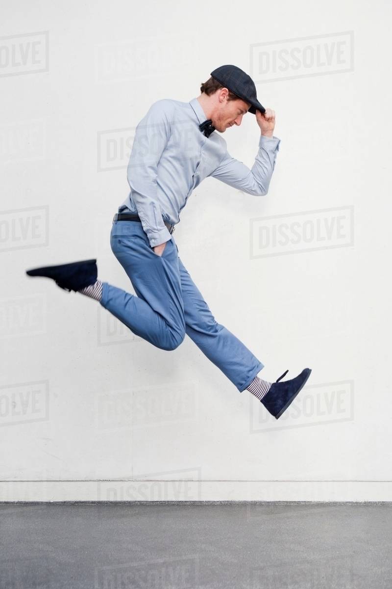 Man jumping in the air - Royalty-free Stock Photo | Dissolve