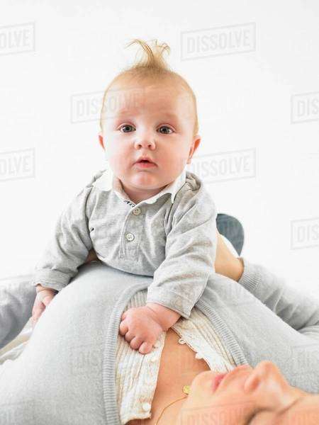 Baby on mother's chest - Royalty-free Stock Photo | Dissolve