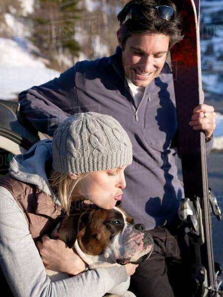 Man and woman in car with dog - Stock Photo - Dissolve