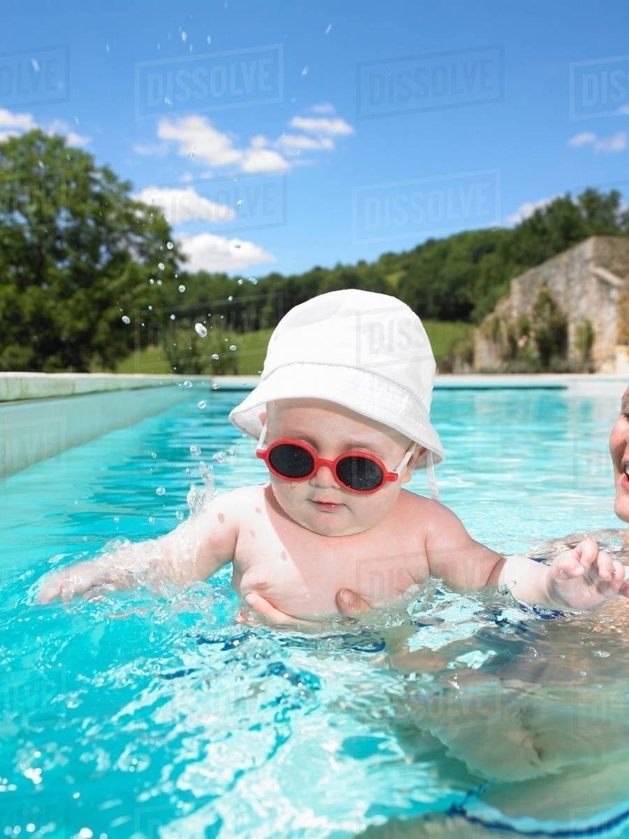 Baby in pool - Royalty-free Stock Photo | Dissolve