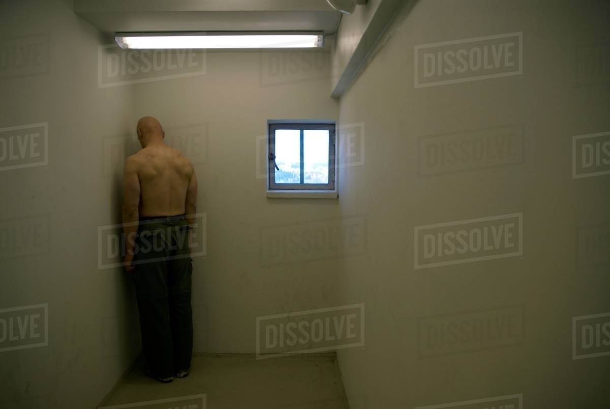 Man in corner of room - Royalty-free Stock Photo | Dissolve