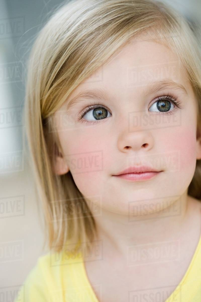 Young girl looking interested - Royalty-free Stock Photo | Dissolve