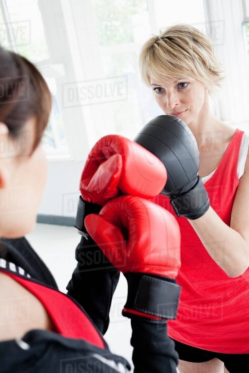 Women boxing against each other - Royalty-free Stock Photo | Dissolve