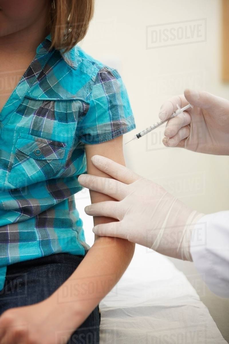 Girl having Injection - Royalty-free Stock Photo | Dissolve