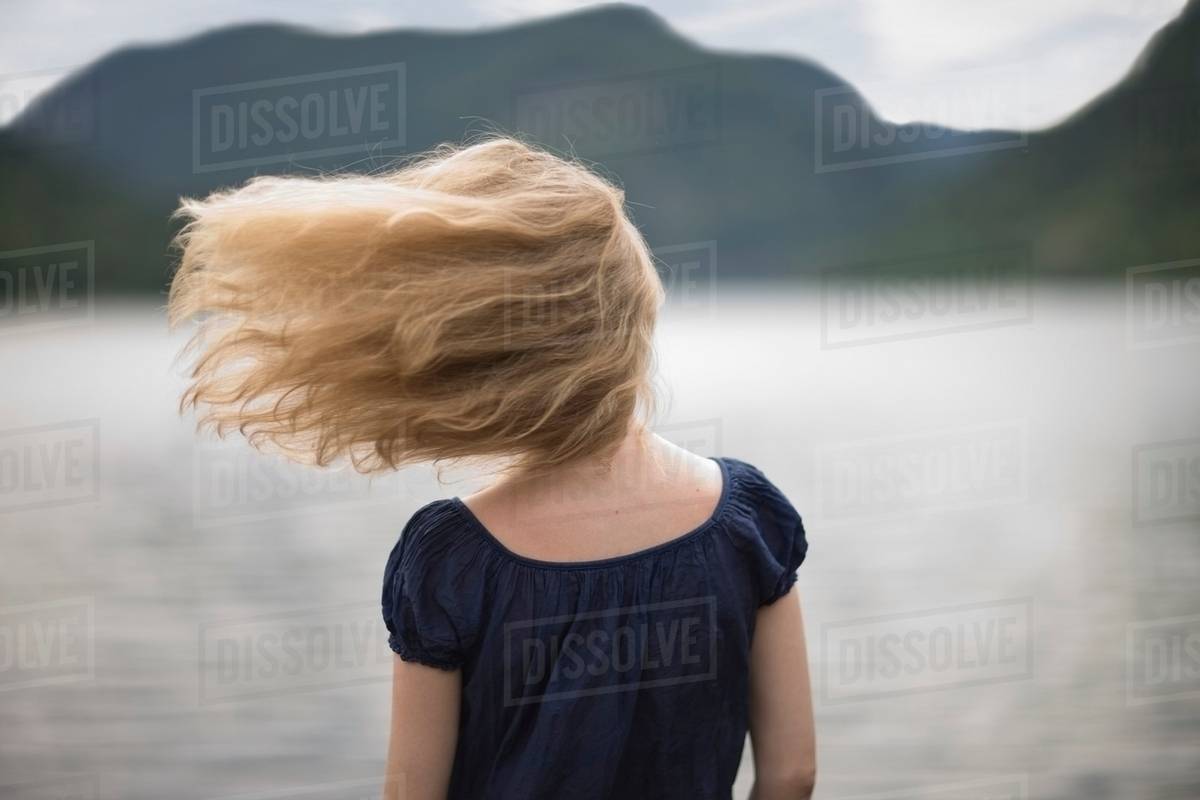 Wind in her hair - Stock Photo - Dissolve
