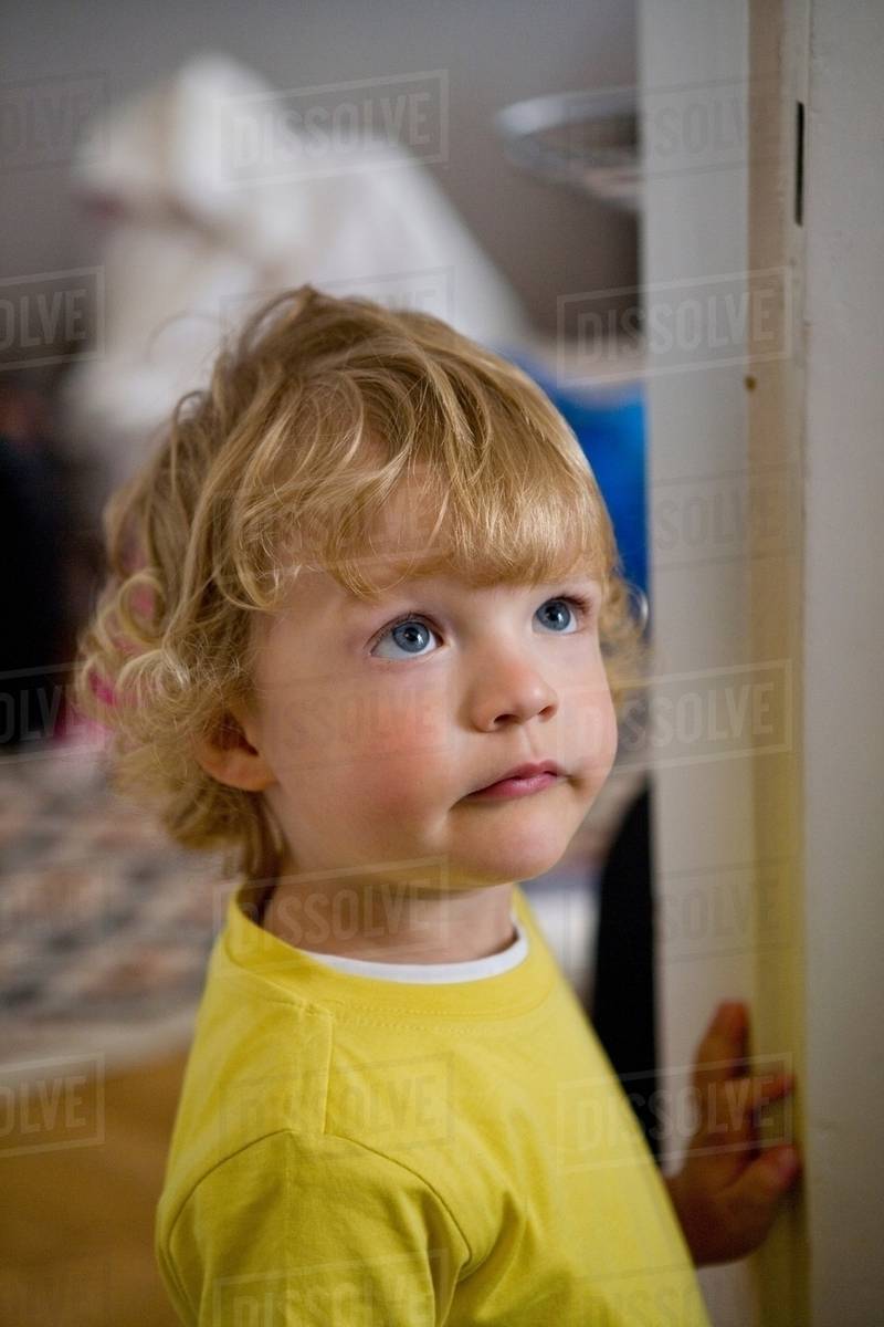 Kid looking up - Royalty-free Stock Photo | Dissolve