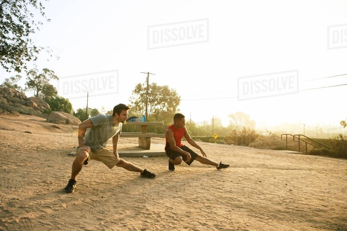Two male friends working out together, outdoors - Royalty-free Stock ...