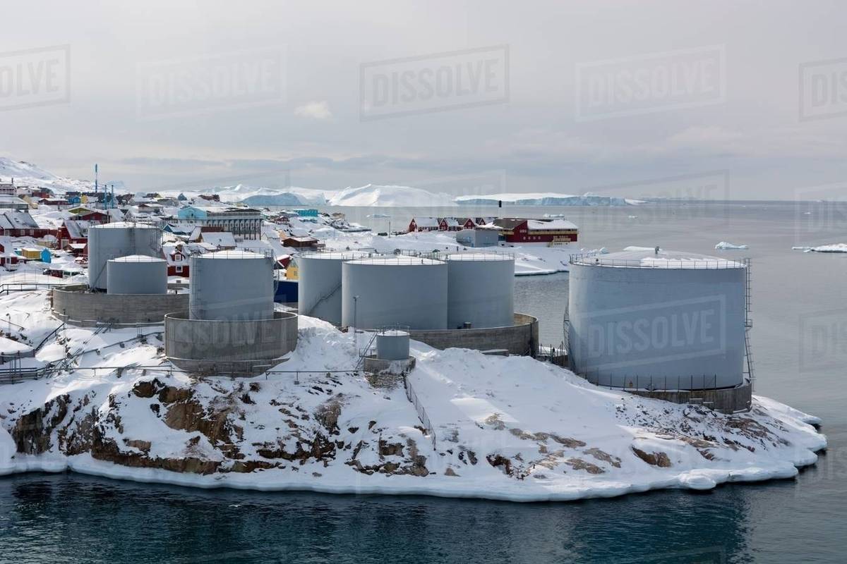 Elevated view of snow covered oil tanks at Ilulissat, Greenland - Stock ...