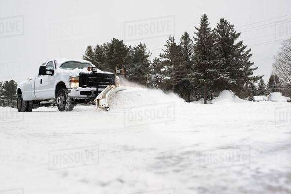 Truck clearing snow - Royalty-free Stock Photo | Dissolve