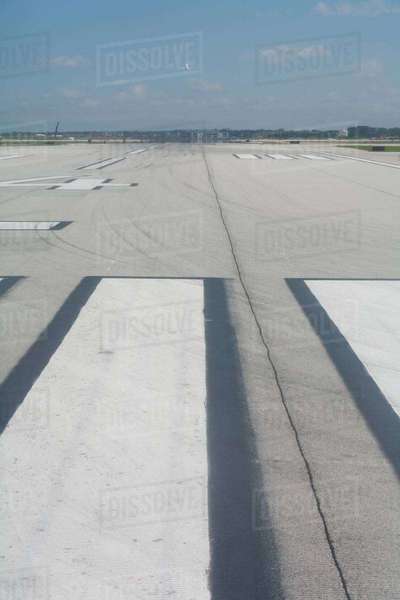 Airport runway, close up - Stock Photo - Dissolve
