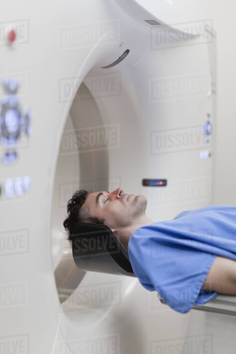 Patient laying in CT scanner in hospital - Royalty-free Stock Photo ...