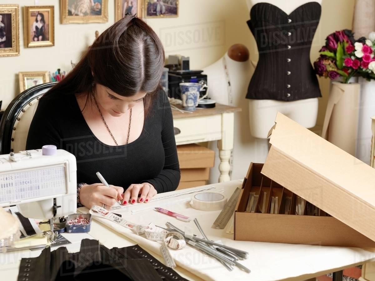 Corset maker working - Stock Photo - Dissolve