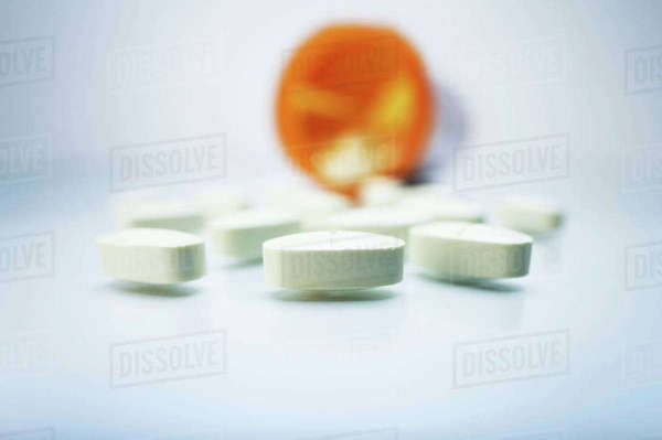 White oval pills - Royalty-free Stock Photo | Dissolve