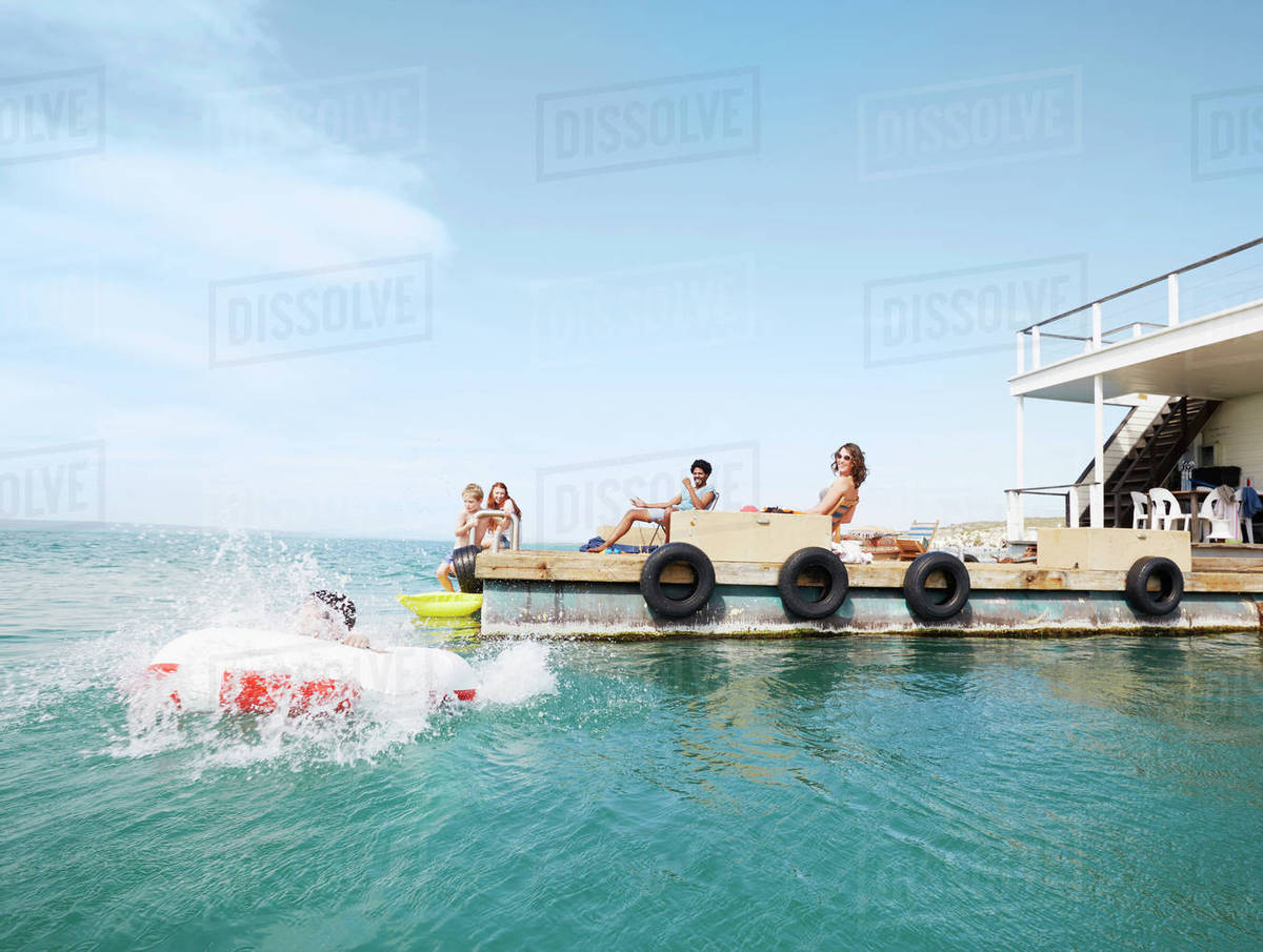 Family having fun on houseboat sun deck, Kraalbaai, South Africa ...