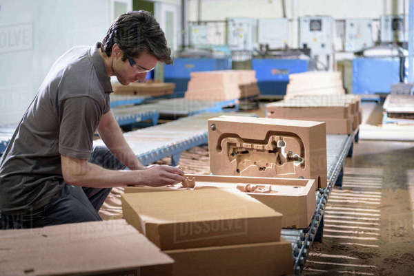 Worker preparing sand mould in precision casting factory - Stock Photo ...