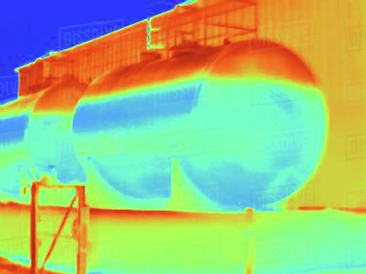 Thermal image of fuel storage tank - Stock Photo - Dissolve