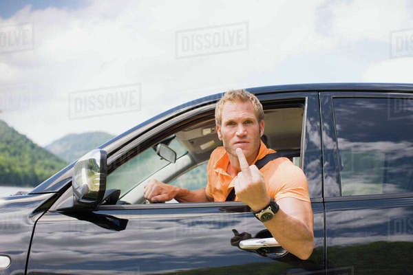 Angry man in a black car - Royalty-free Stock Photo | Dissolve