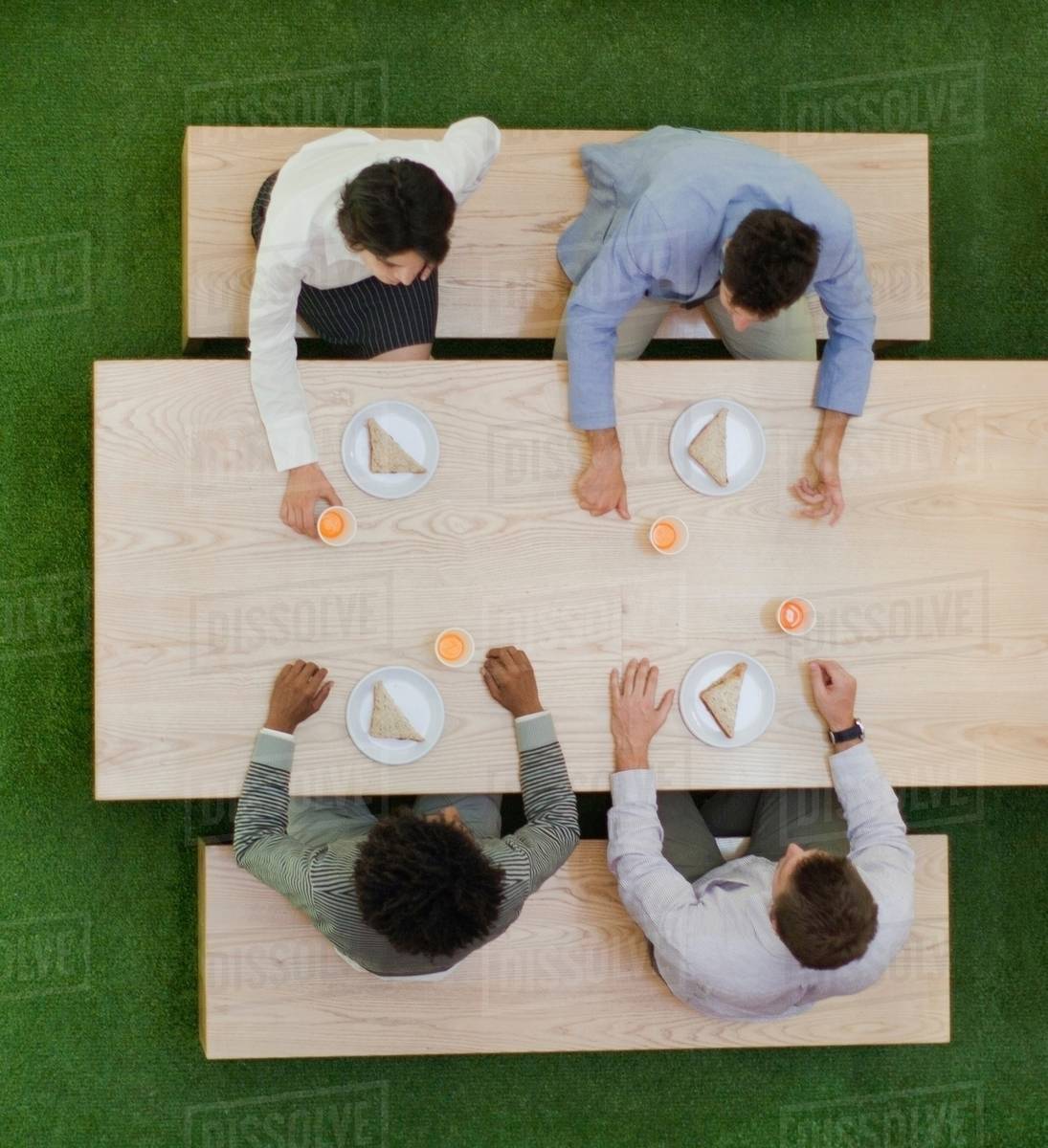 Business people eating together at table - Royalty-free Stock Photo ...