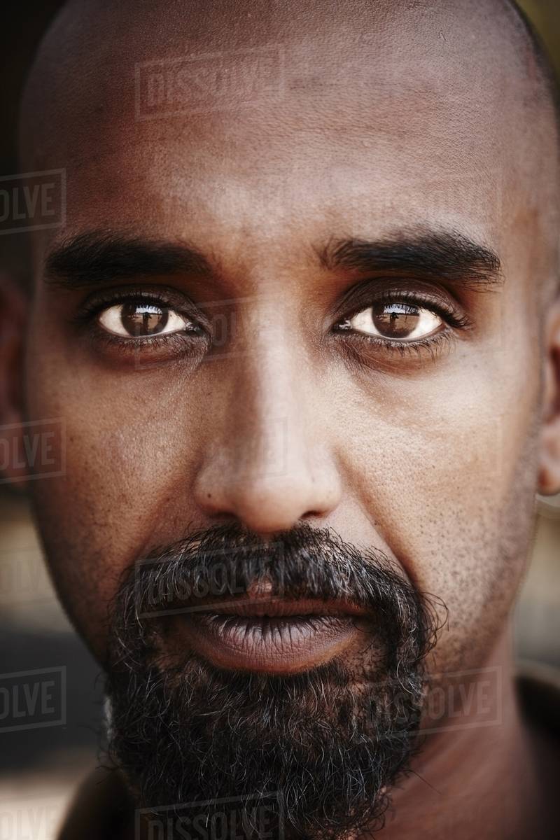 Close up of reflection in mans eyes - Stock Photo - Dissolve
