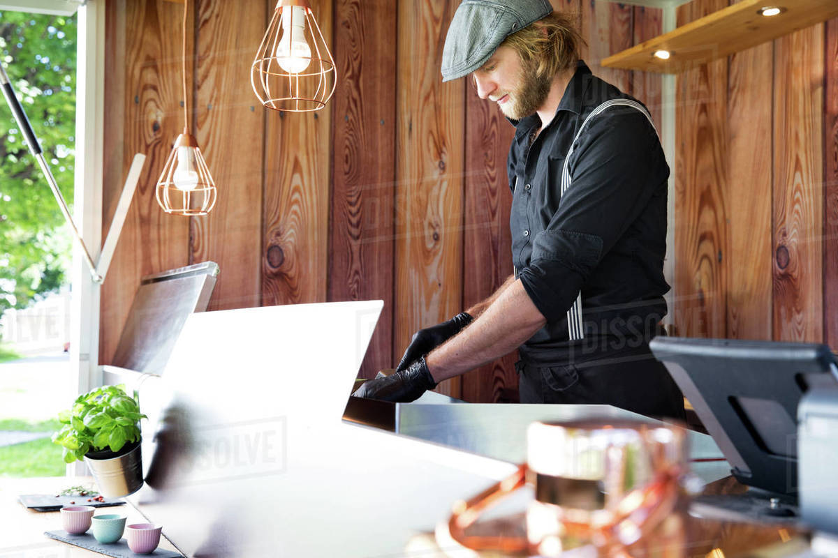 Cook working in food truck, Innsbruck Tirol, Austria - Stock Photo ...