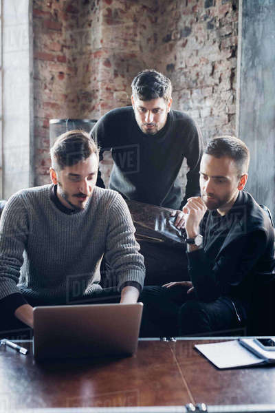 Designers at work in studio - Stock Photo - Dissolve