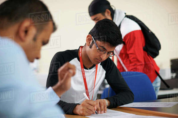 Lecturer talking to college students in classroom - Royalty-free Stock ...